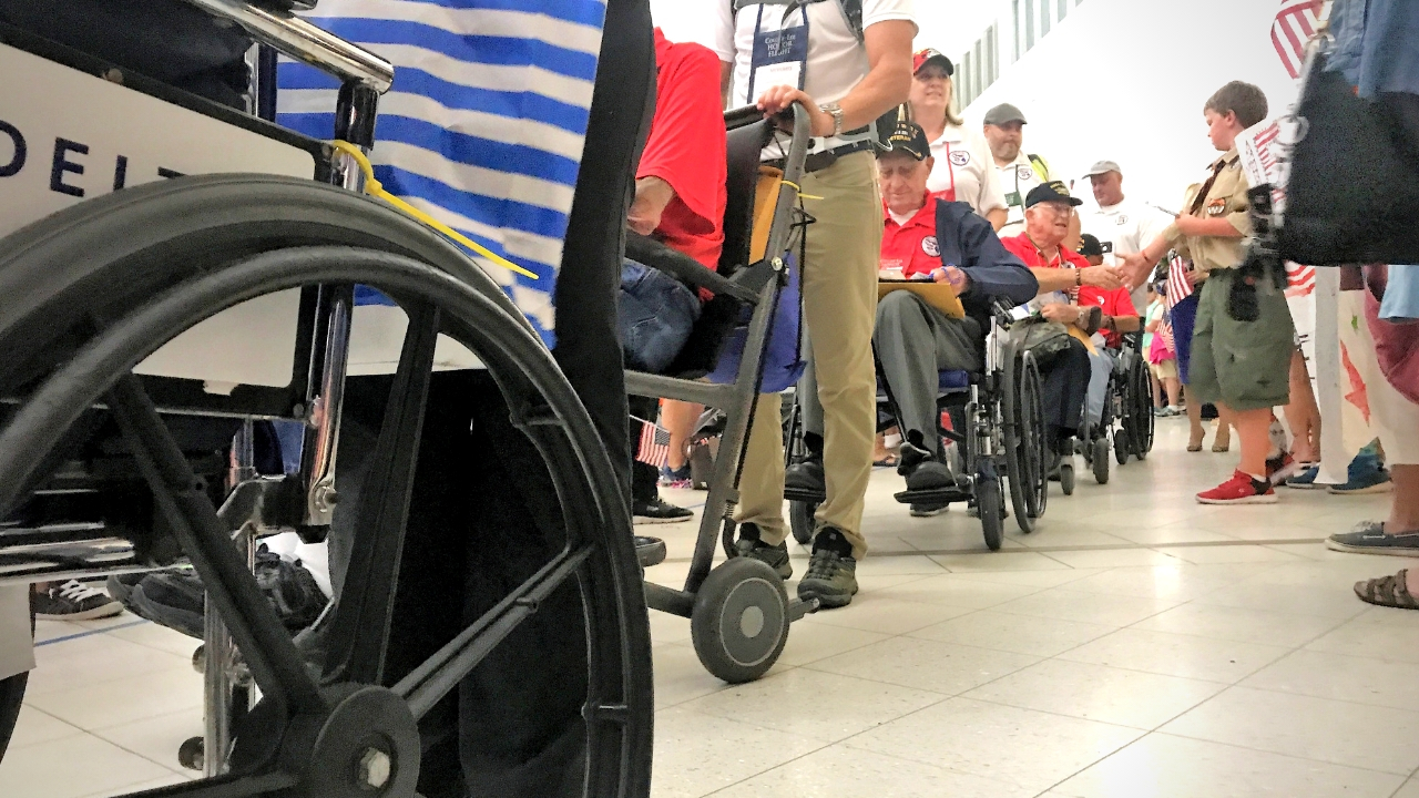 I Witnessed My First Honor Flight Welcome Home Ceremony! - Solo Travel Girl